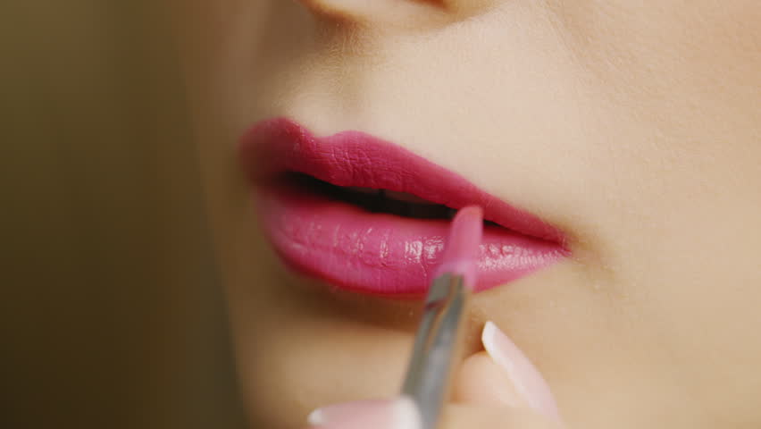 Woman Applying Pink Lip Gloss Close Up Stock Footage Video 1106002