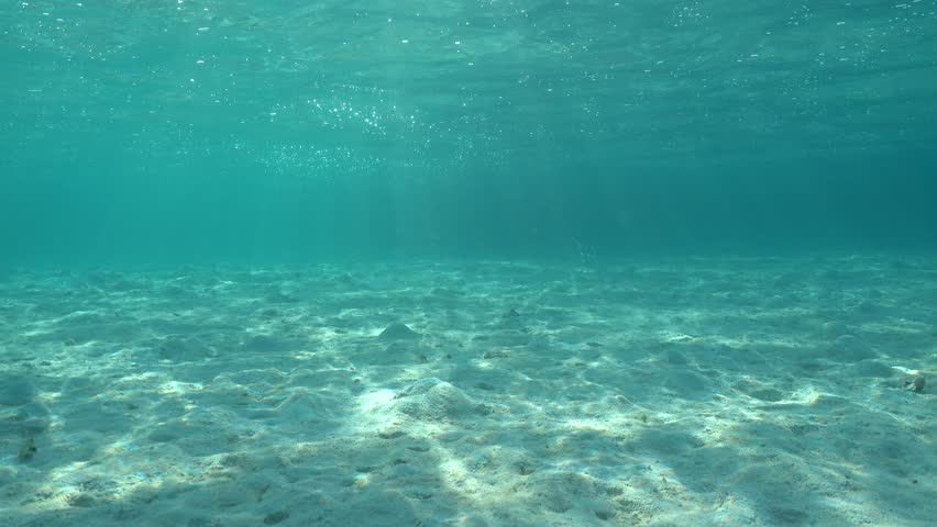 Underwater Hd Video Of Dappled Sunlight On Ocean Floor Stock Footage