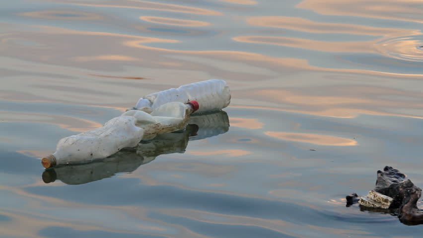 Plastic Bottles Floating In And Polluting River Stock Footage Video ...