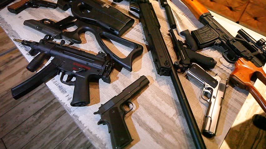 Rifles Pistols And Guns On The Table Stock Footage Video 12937289 ...