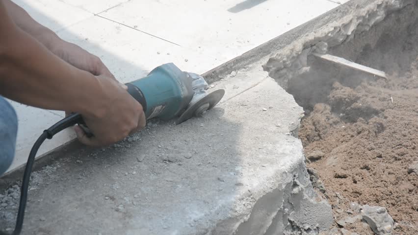 Manual Worker Cutting Concrete Floor With A Power Saw Stock Footage ...