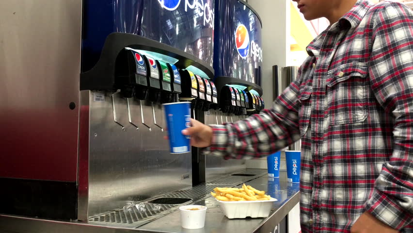 Soft Drink Dispensing From A Soda Fountain Dispenser Popular In Fast ...