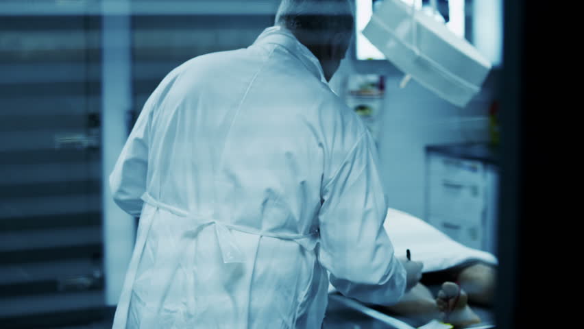 The Lifeless Naked Body Of A Young Mixed Race Male Is Laid Out On The ...