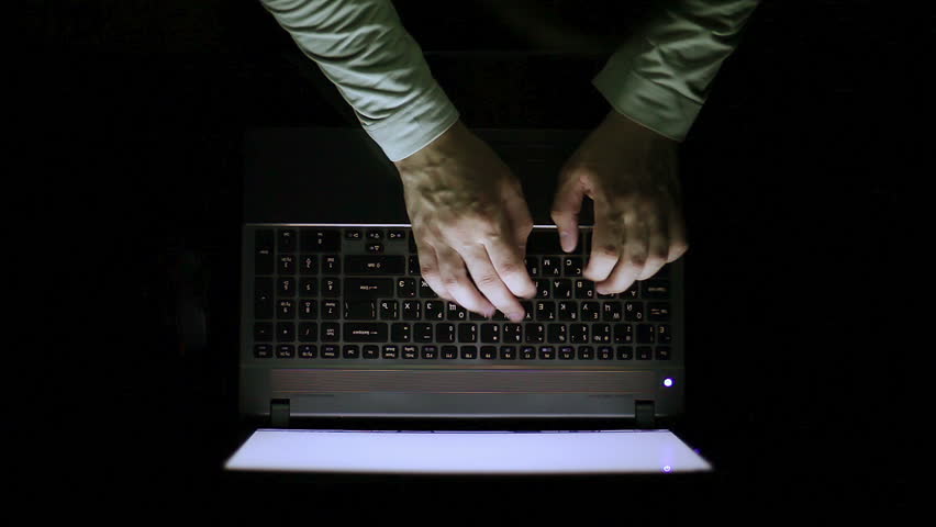 TOP VIEW: Adult Man Typing On A Laptop Keyboard In A Dark Room Stock ...