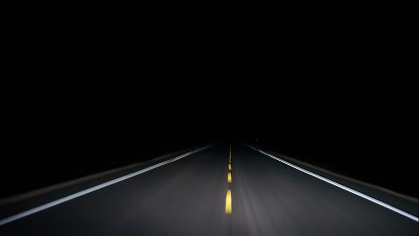 Driving Down A Twisting And Turning Dark Rural Highway At Night ...