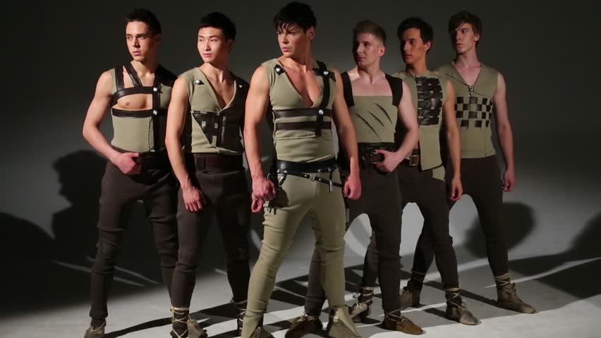 Group Of Six Young Beautiful Men In Costumes Poses During Photo Session ...