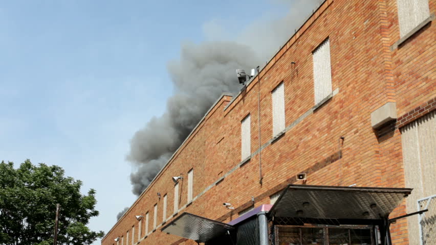 Fire Smoke Coming From The Roof Of A Building Stock Footage Video ...