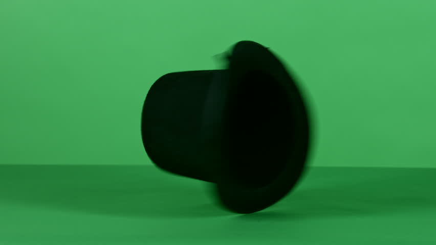 Magical Black Top Hat Rotates In Front Of A Green Screen Background ...