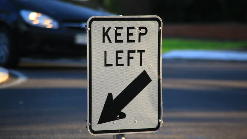 Traffic Sign"Keep Left" Stock Footage Video 885274 - Shutterstock