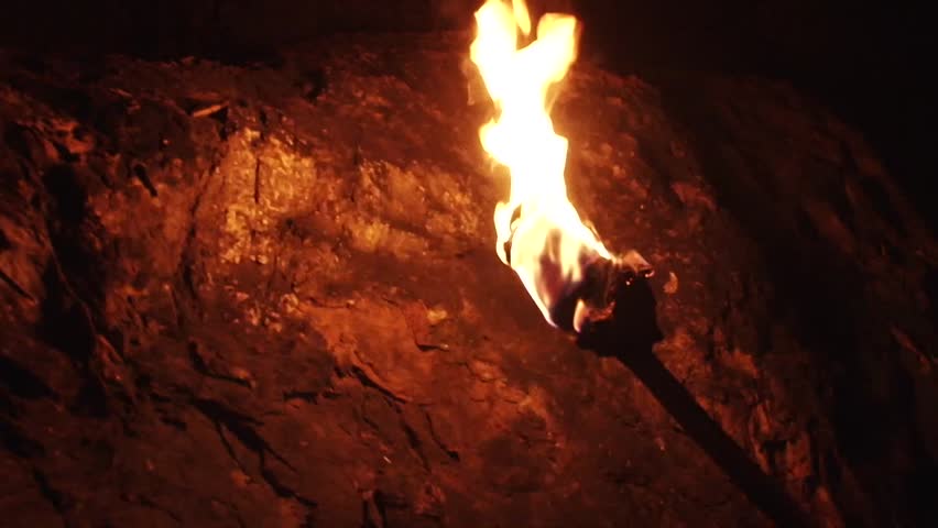 A Burning Wood Made Primitive Torch, With Strong Flame, Held In Hand By ...